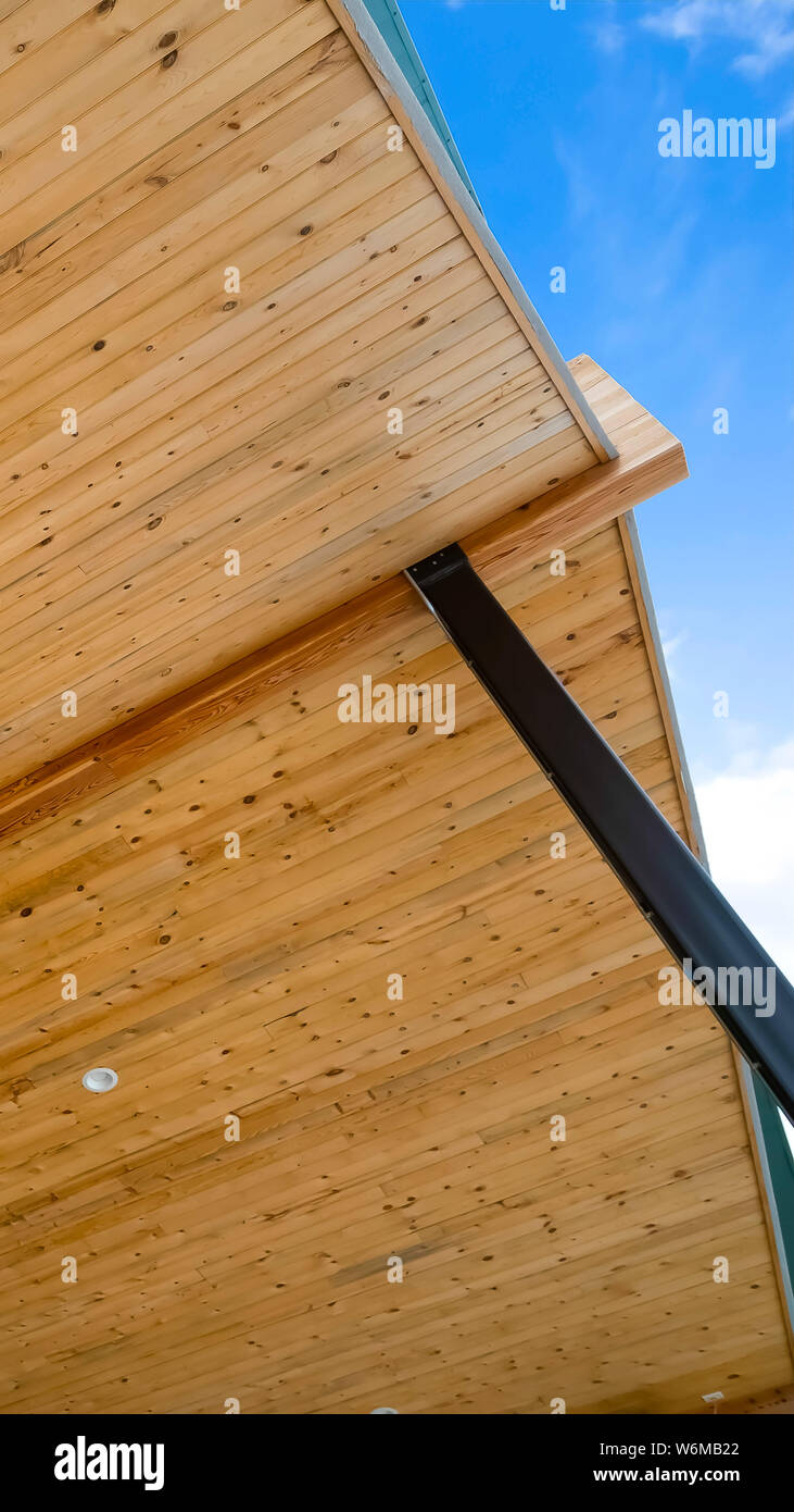 Vertical frame Close up view of the underside of the roof of a house ...