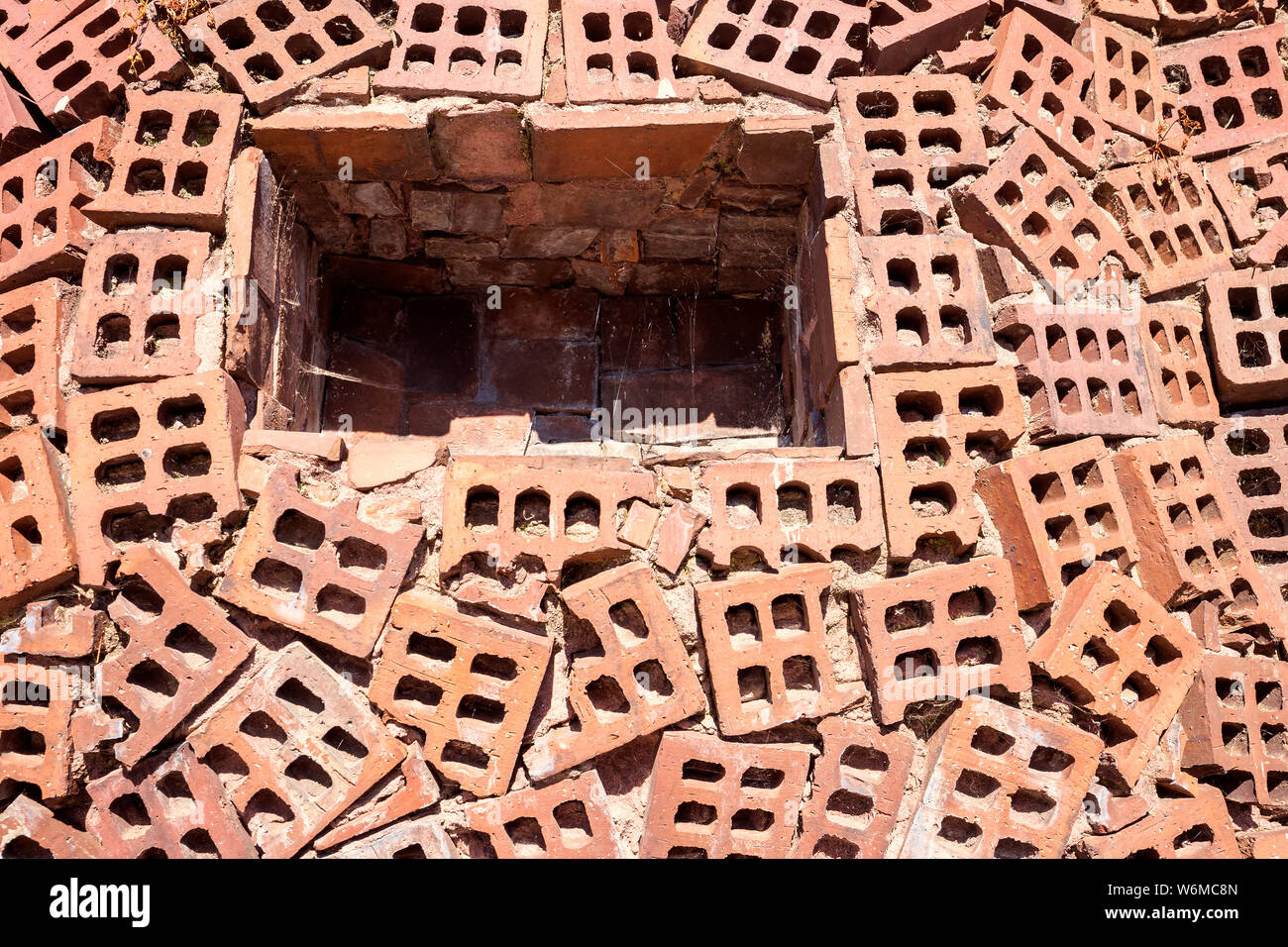 background of niche on brick facade with a holes pattern Stock Photo ...