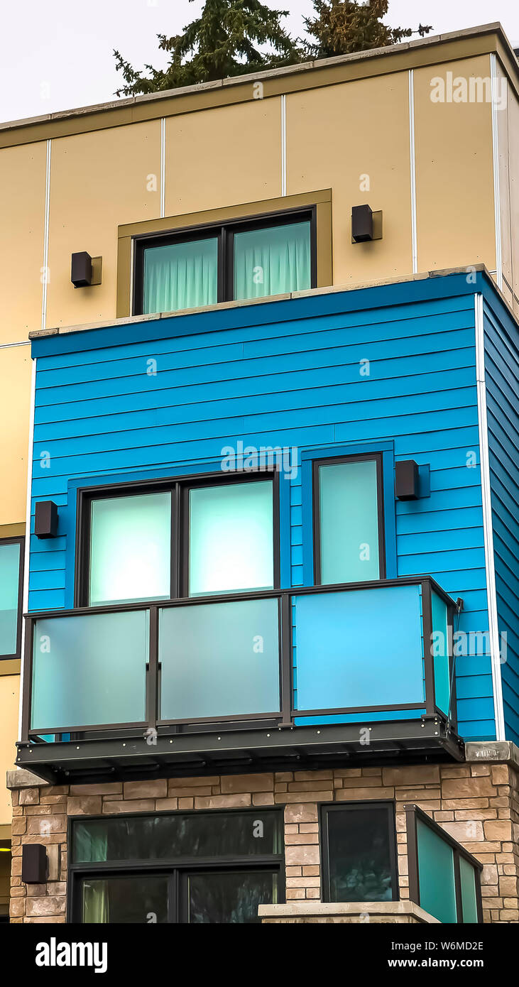 Vertical frame Residential building with horizontal siding concrete and ...
