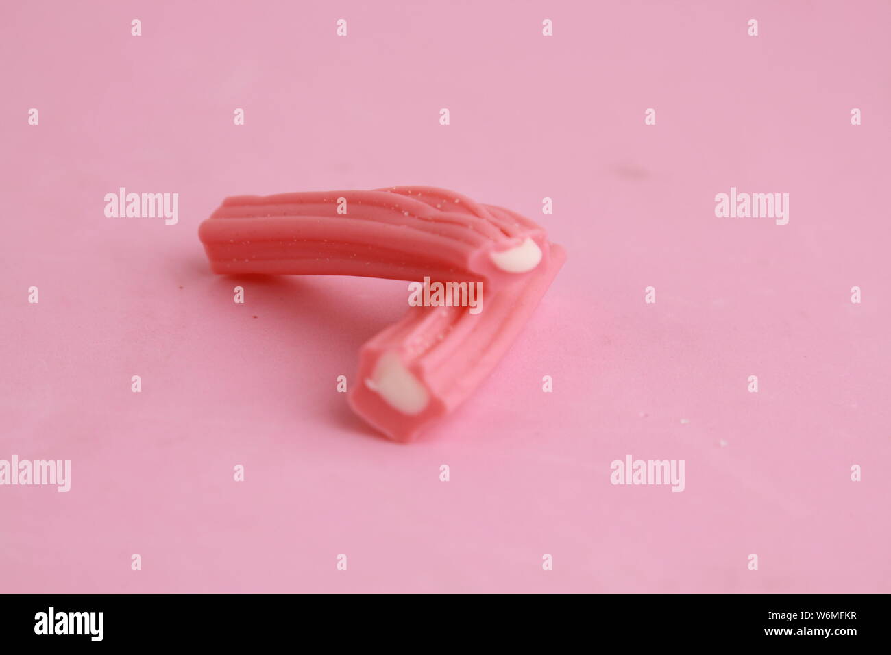 pink and white jelly licorice Stock Photo - Alamy