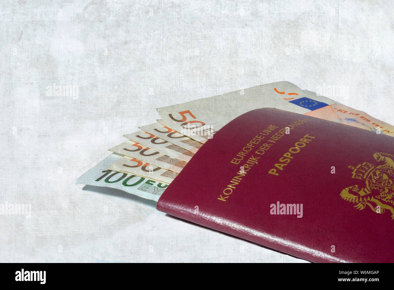 euros and european passport Stock Photo - Alamy