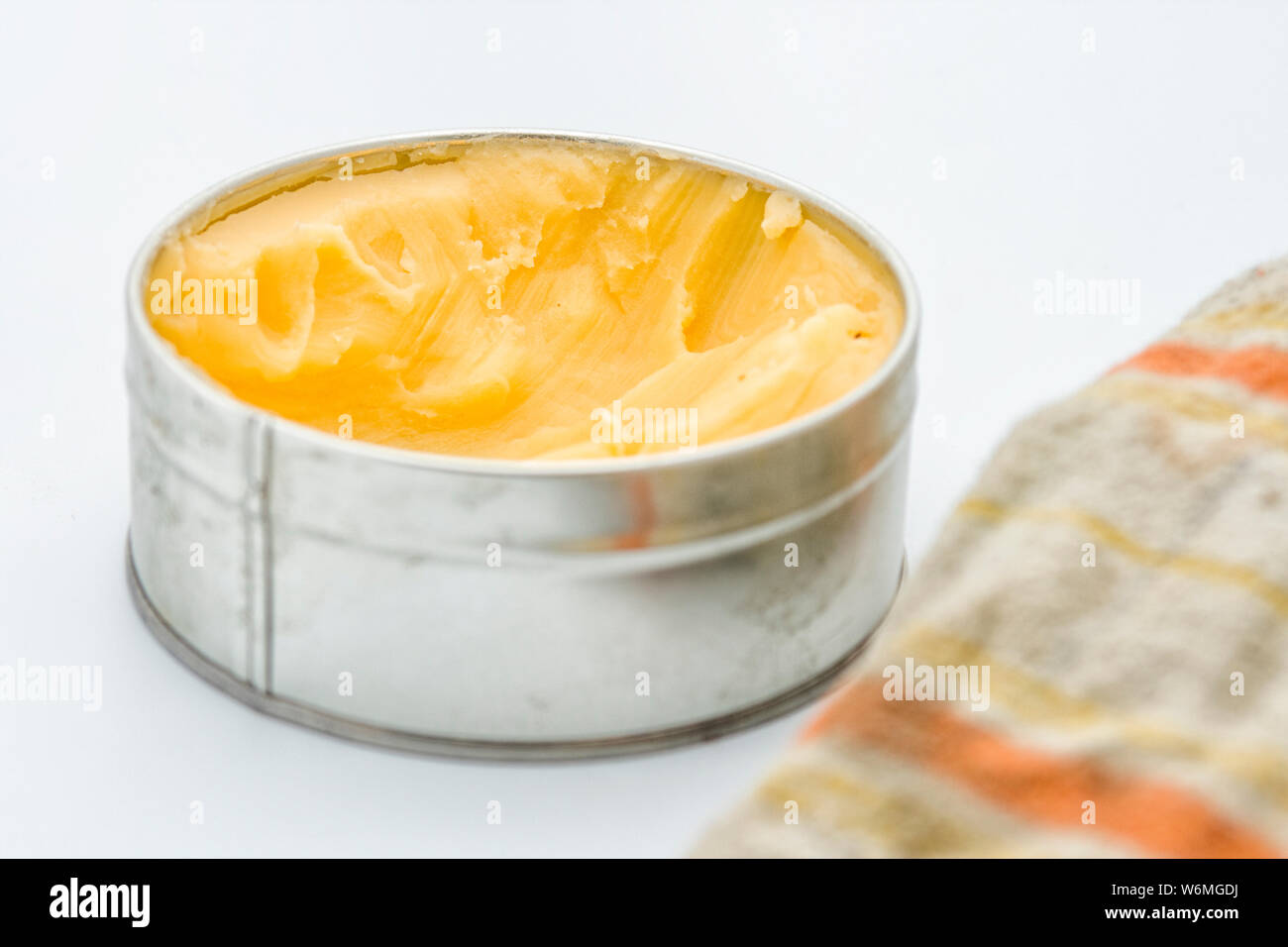 wax in can with cloth. Focus on the wax Stock Photo - Alamy