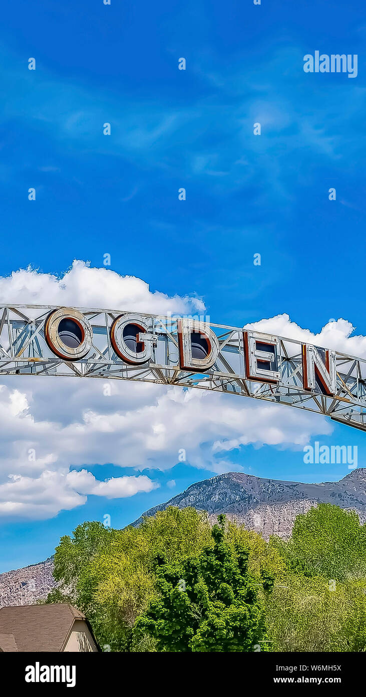 Vertical frame Welcome arch at the city of Ogden Utah against vivid ...