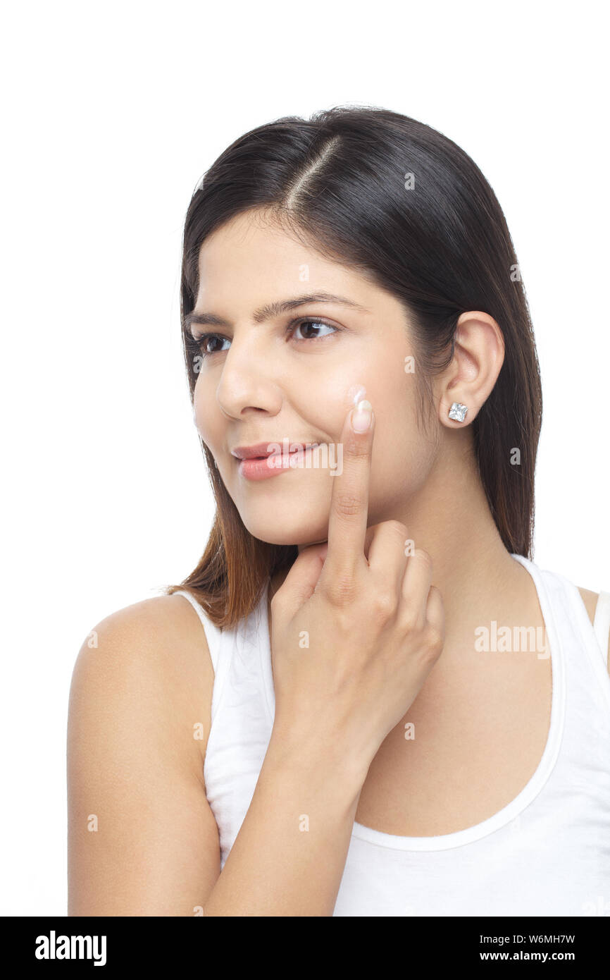 Woman finger on cheek hi-res stock photography and images - Alamy