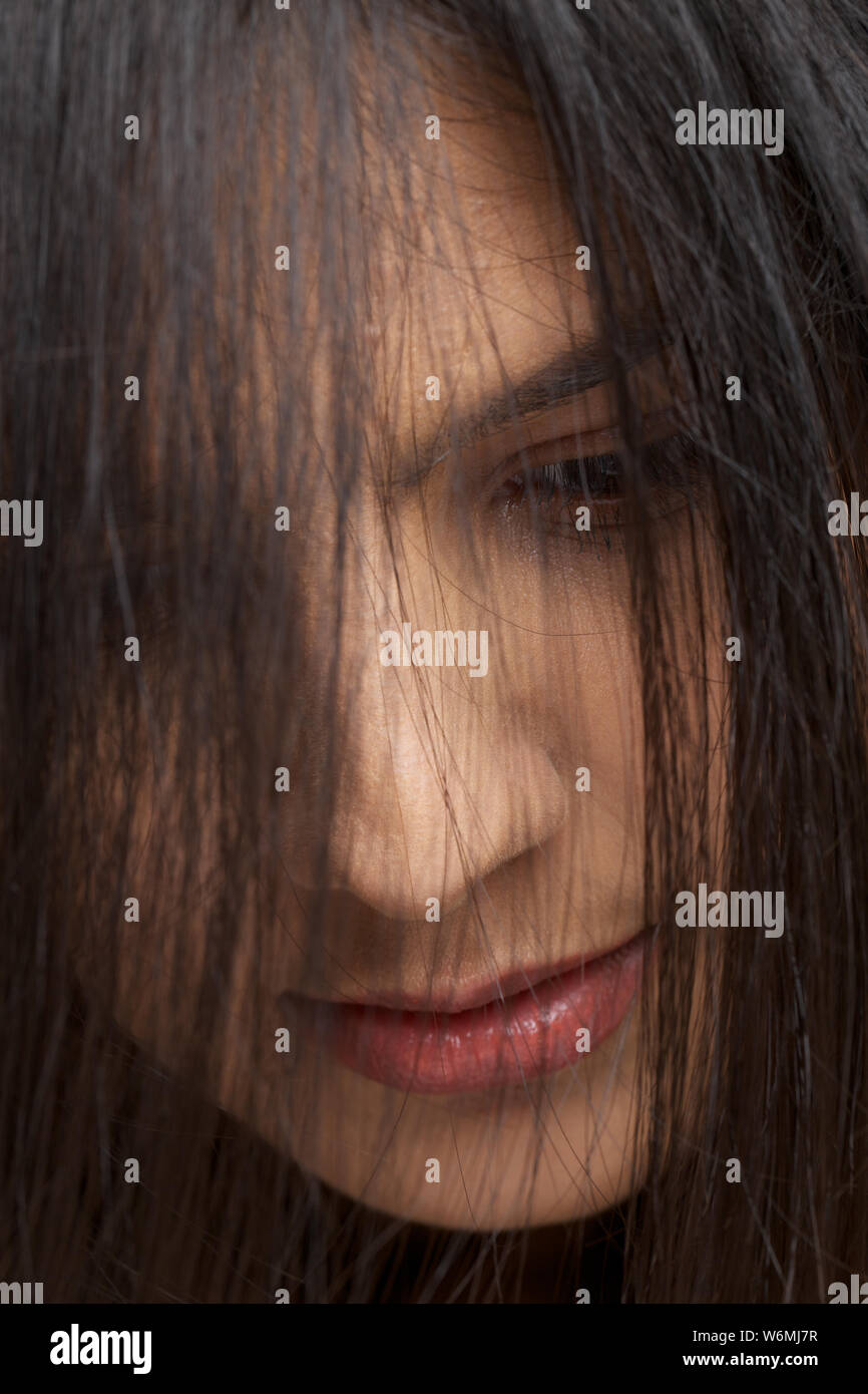 Hair over face hi-res stock photography and images - Alamy