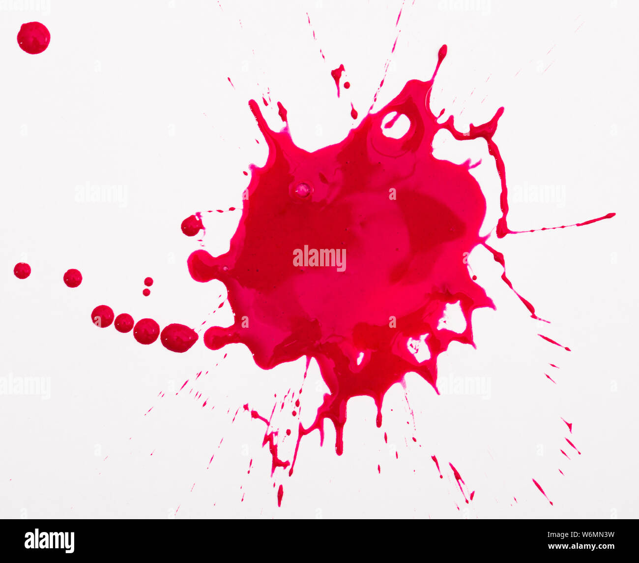 Closeup of shapeless bright red ink blot on white background Stock ...