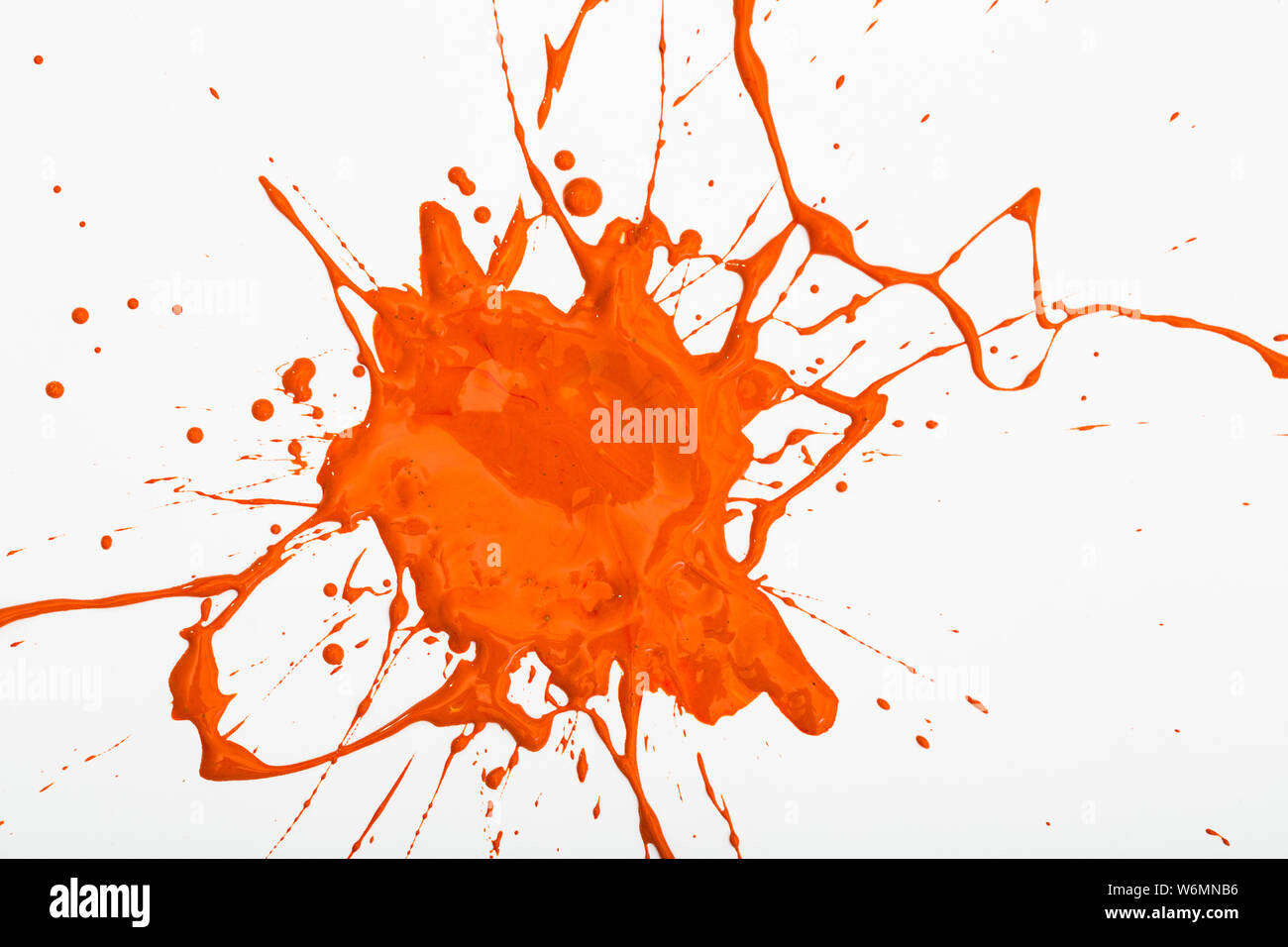 Blot and splashes of orange paint isolated on white background Stock ...