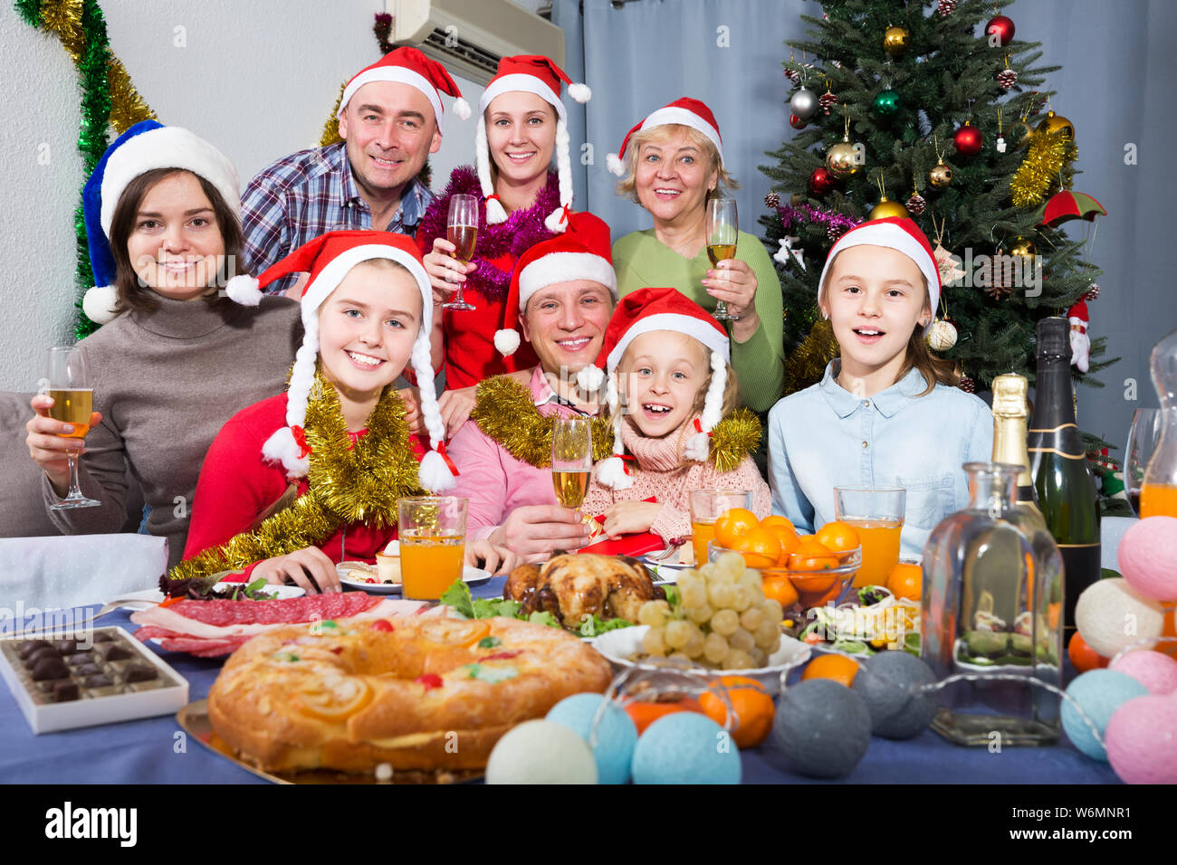 Portrait of happy family who is celebration New Year together at home ...