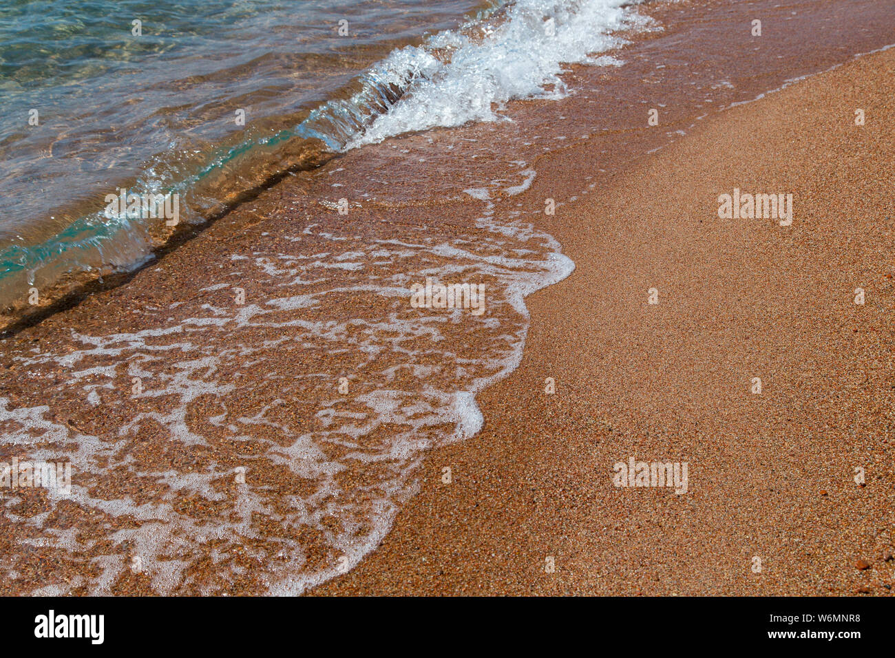 sandy beach and blue sea wave. Beautiful natural background. Tourism and travel Stock Photo - Alamy