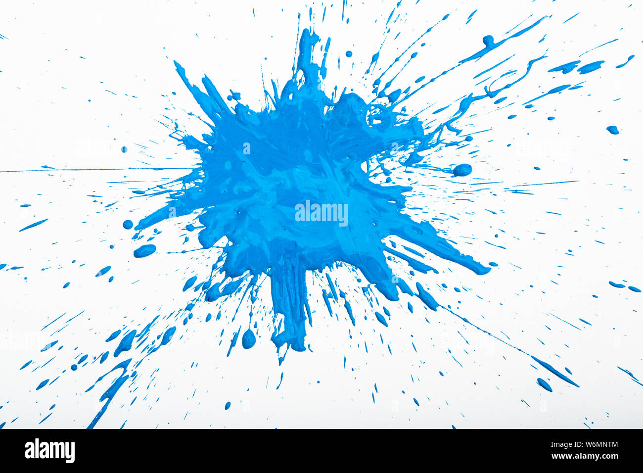 Stain with splashes and drops of bright blue color Stock Photo - Alamy