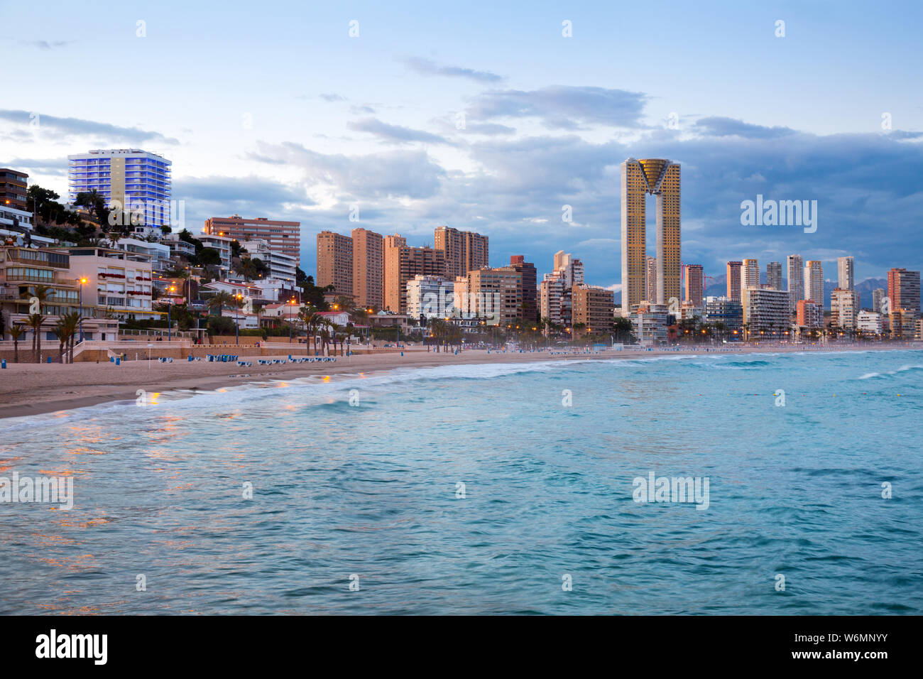 night panoramic view on lights of Benidorm city with seafront and ...