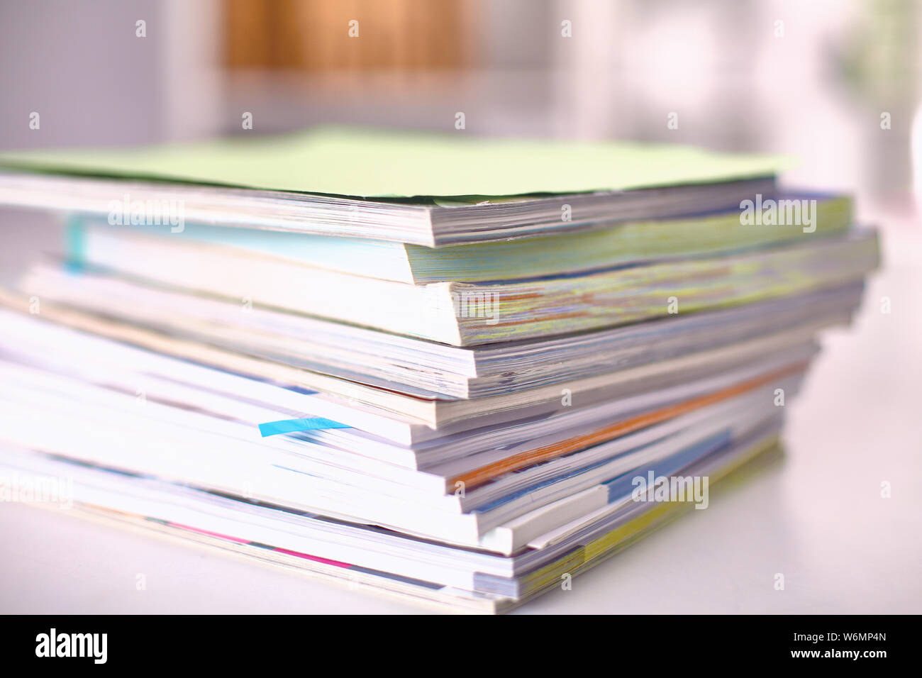 close up of stack of papers on white background Stock Photo - Alamy