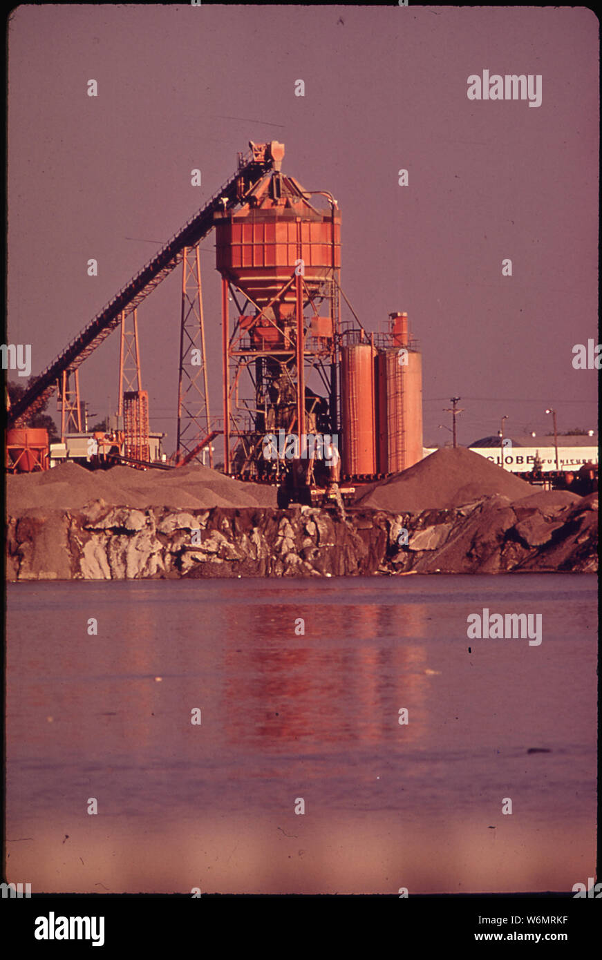 UNION ROCK AND MATERIAL PLANT. THE TRUCK IS DUMPING CONCRETE INTO THE ...