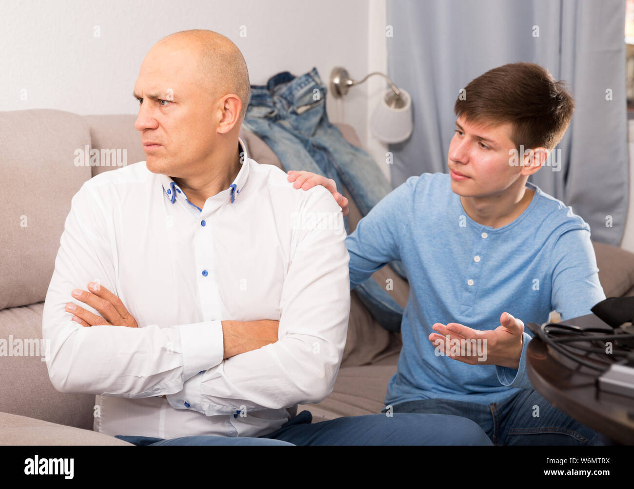 Son apologize to father hi-res stock photography and images - Alamy