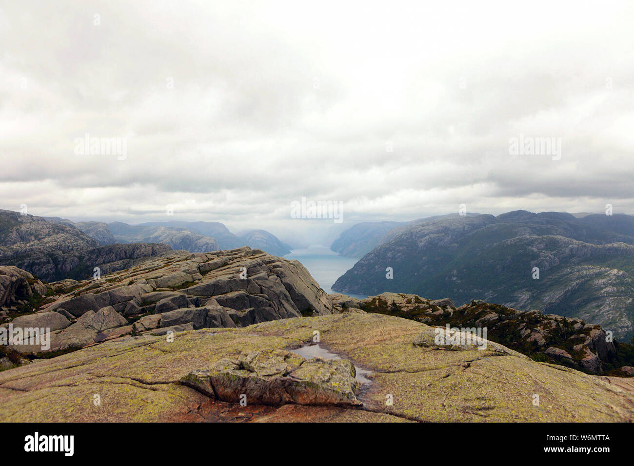 Granite rocks and mountains on the Road to the Cliff Preikestolen in ...
