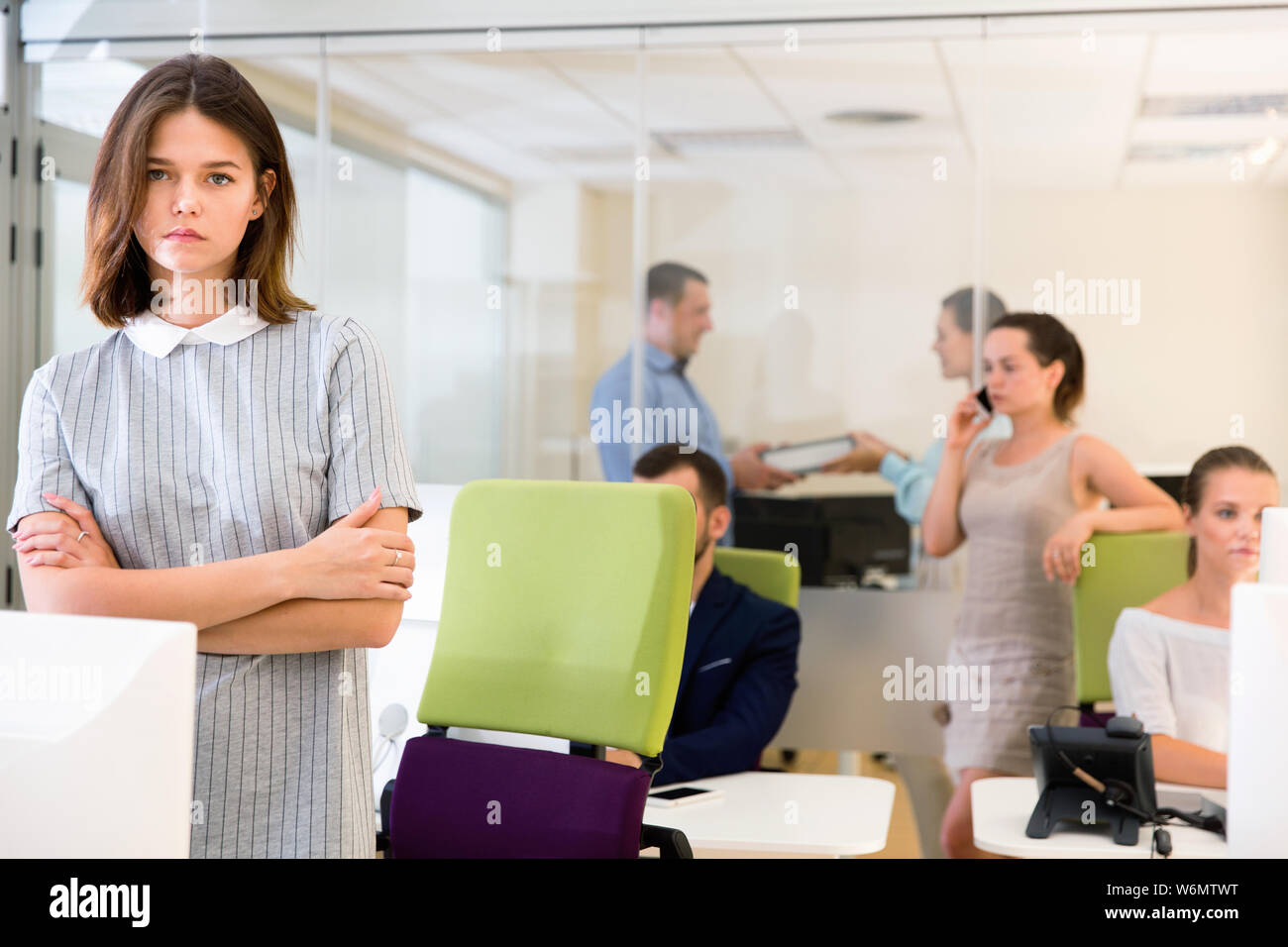 Portrait of frustrated young unhappy angry sad business woman in ...
