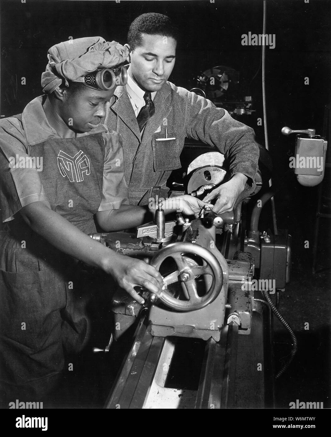 Under the direction of Cecil M. Coles, NYA foreman, Miss Juanita E ...