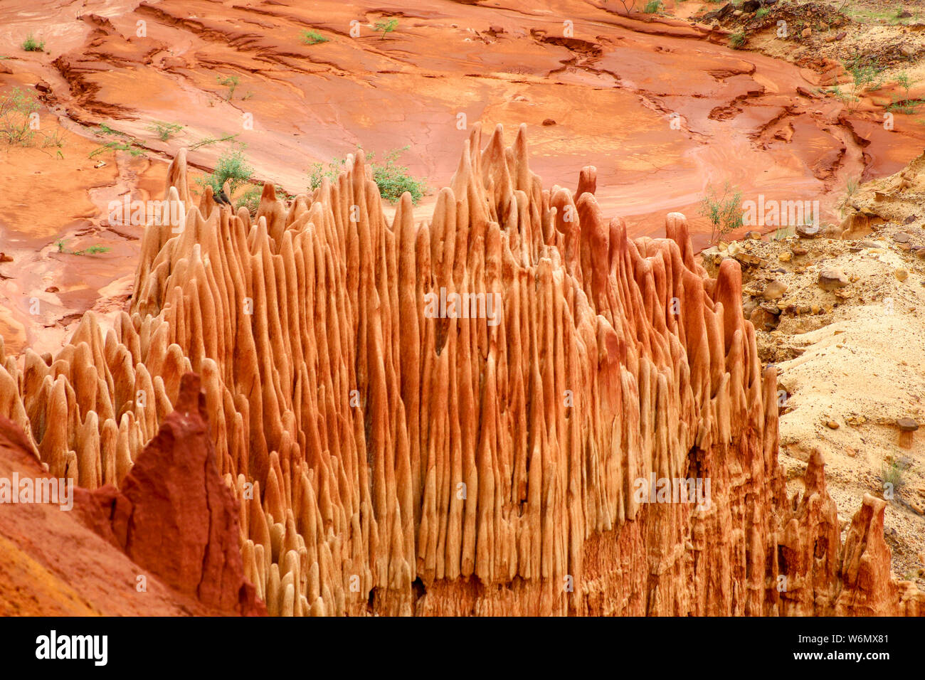 Red sandstone formations and needles (Tsingys) in Tsingy Rouge Park in ...