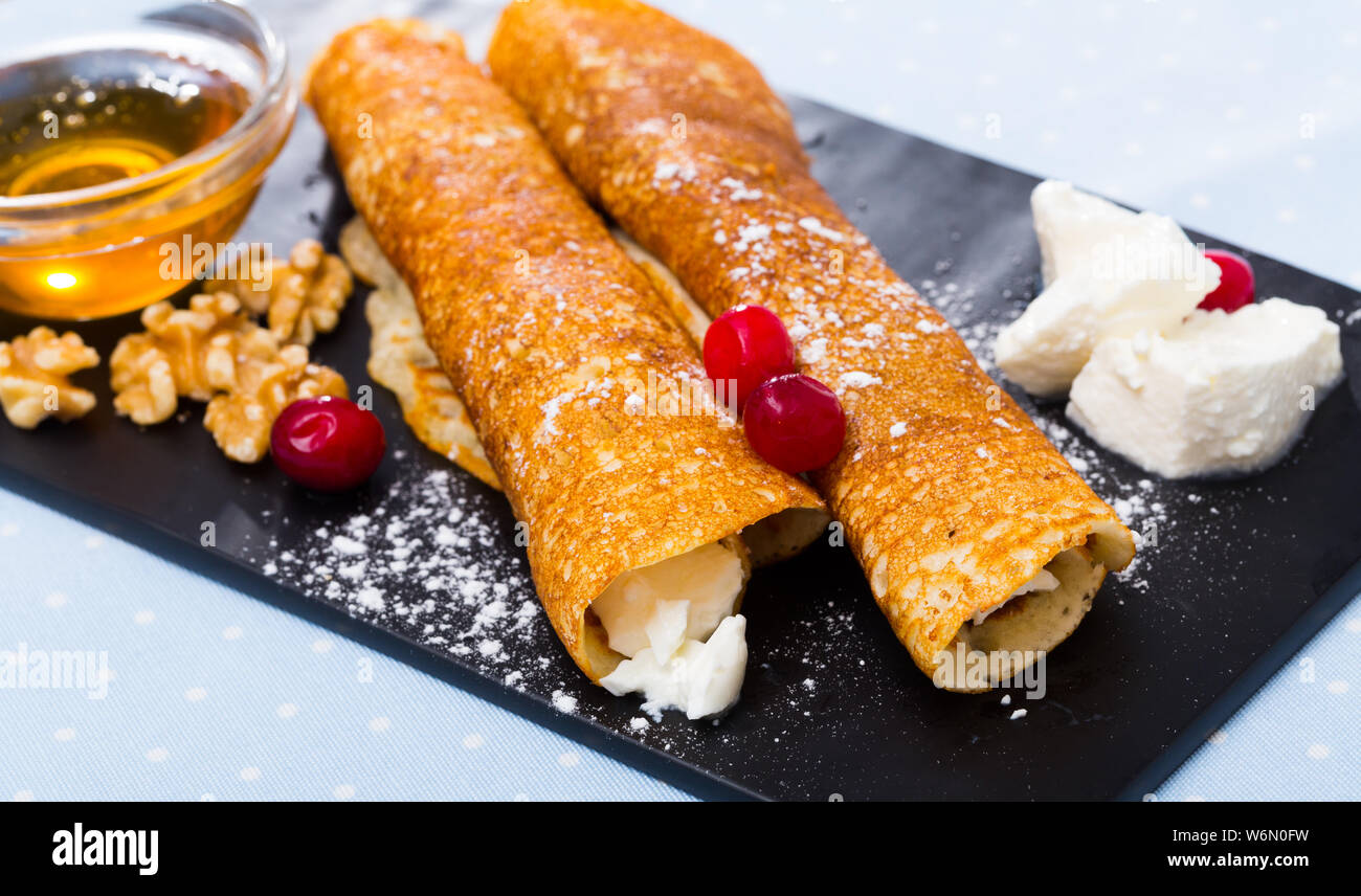 Traditional Bulgarian Palachinka crepes stuffed with brinsen cheese and ...