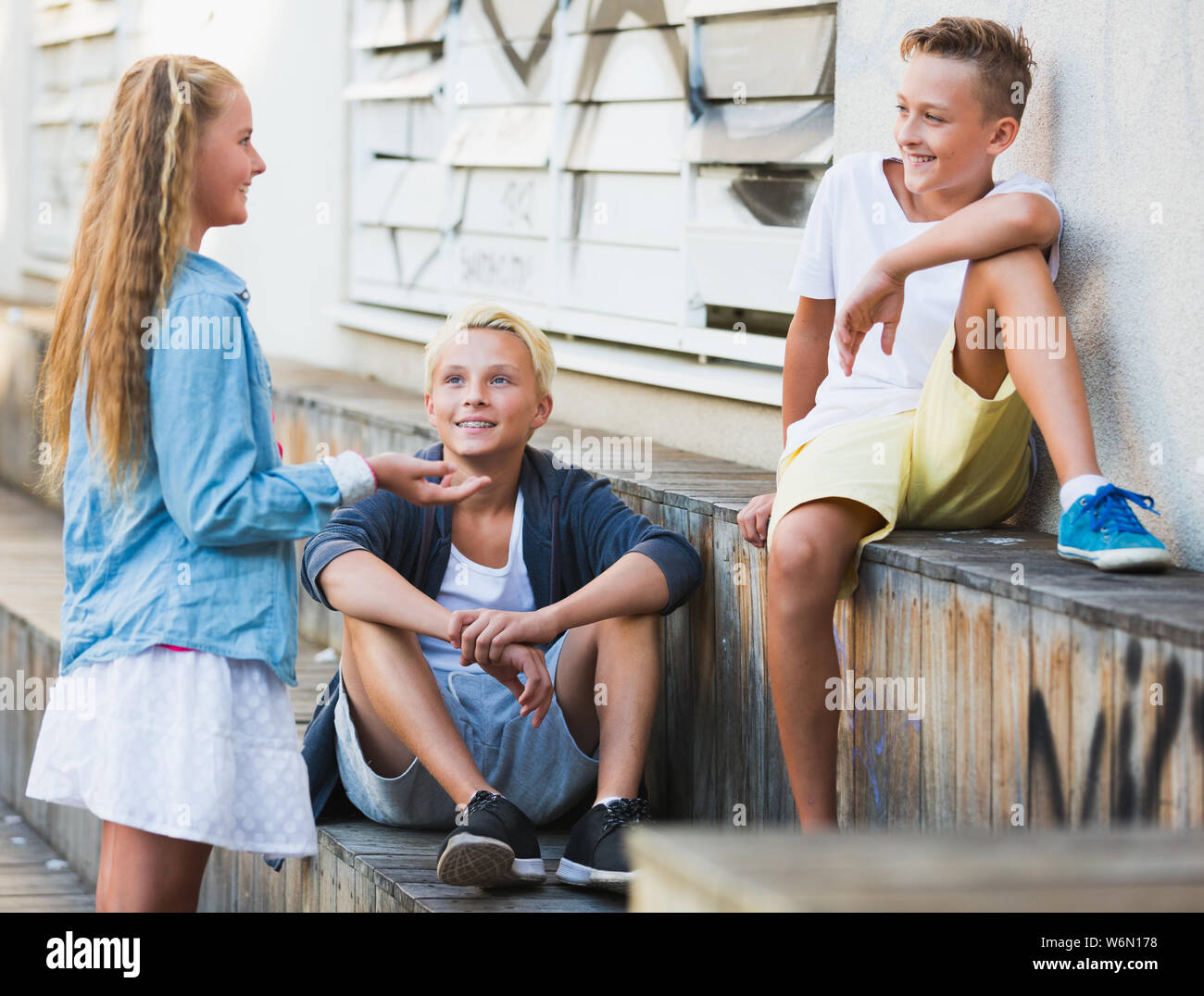 Two boys having conversation hi-res stock photography and images - Alamy
