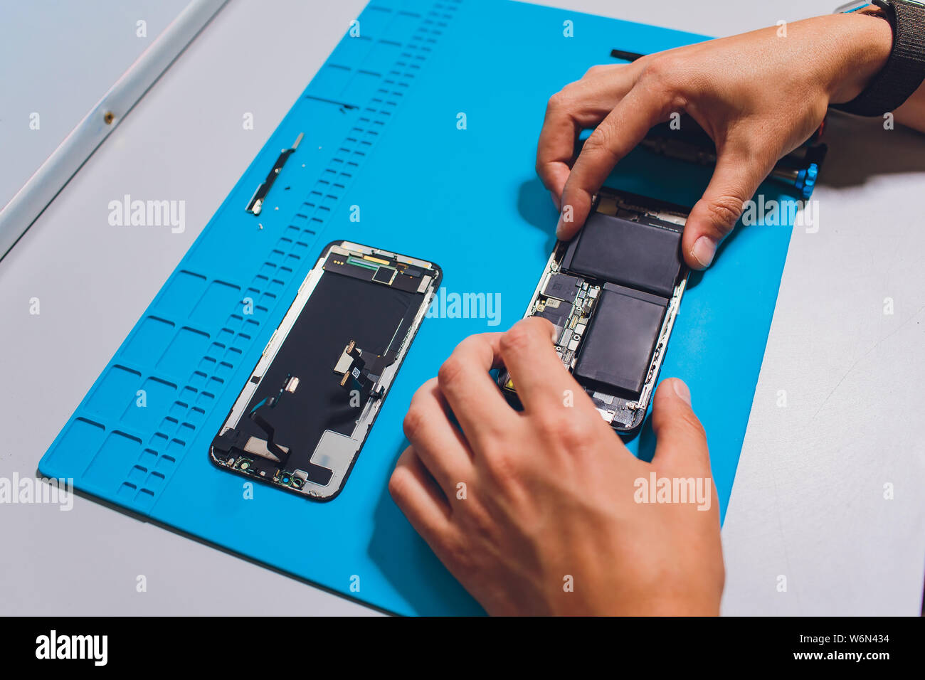 Close-up photos showing process of mobile phone repair Stock Photo - Alamy
