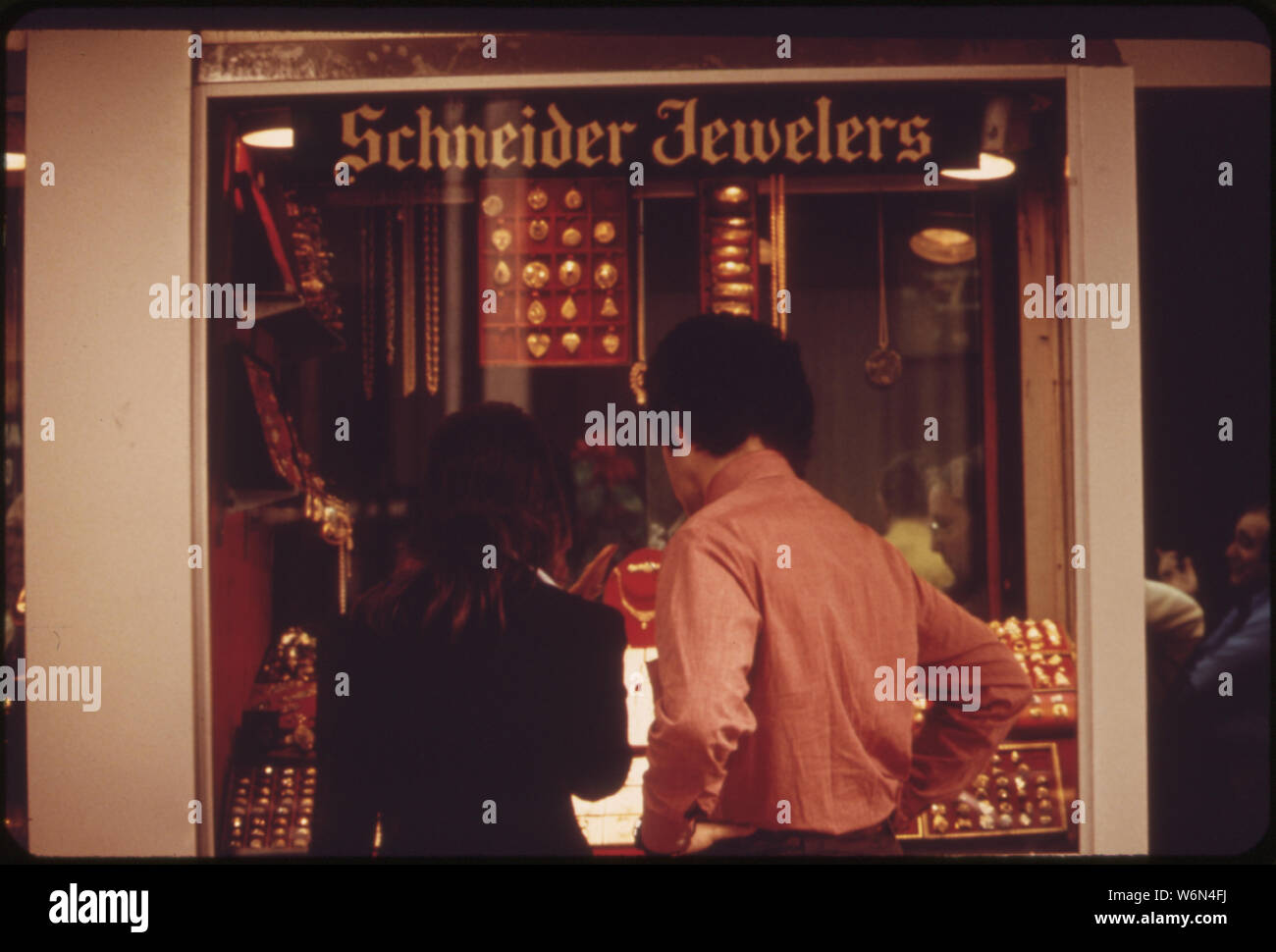 WINDOW SHOPPING ON 6TH AVENUE OF 47TH STREET IN MANHATTAN Stock Photo ...