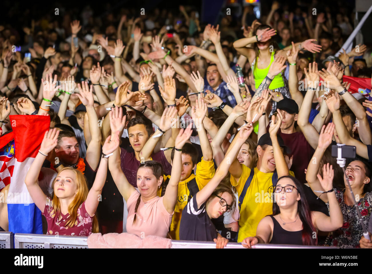 Crowd people dance dancing hands up hi-res stock photography and images ...