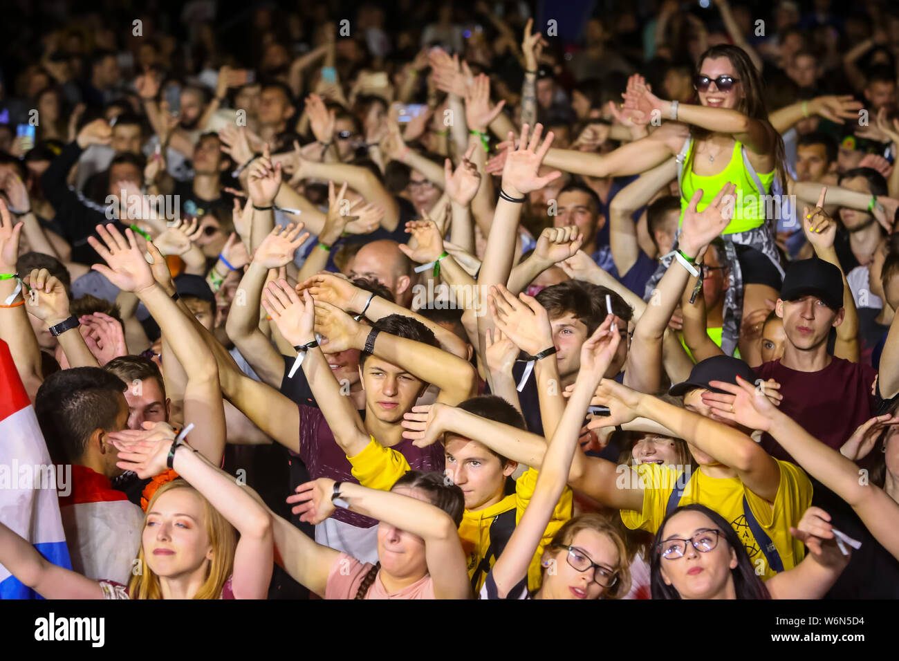 Crowd people dance dancing hands up hi-res stock photography and images ...