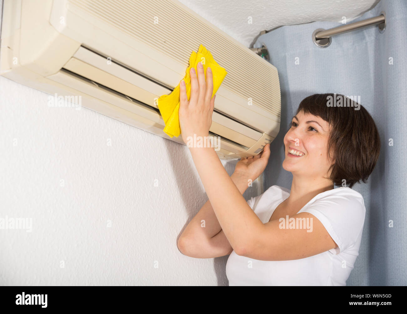 Wall mounted housekeeper hi-res stock photography and images - Alamy