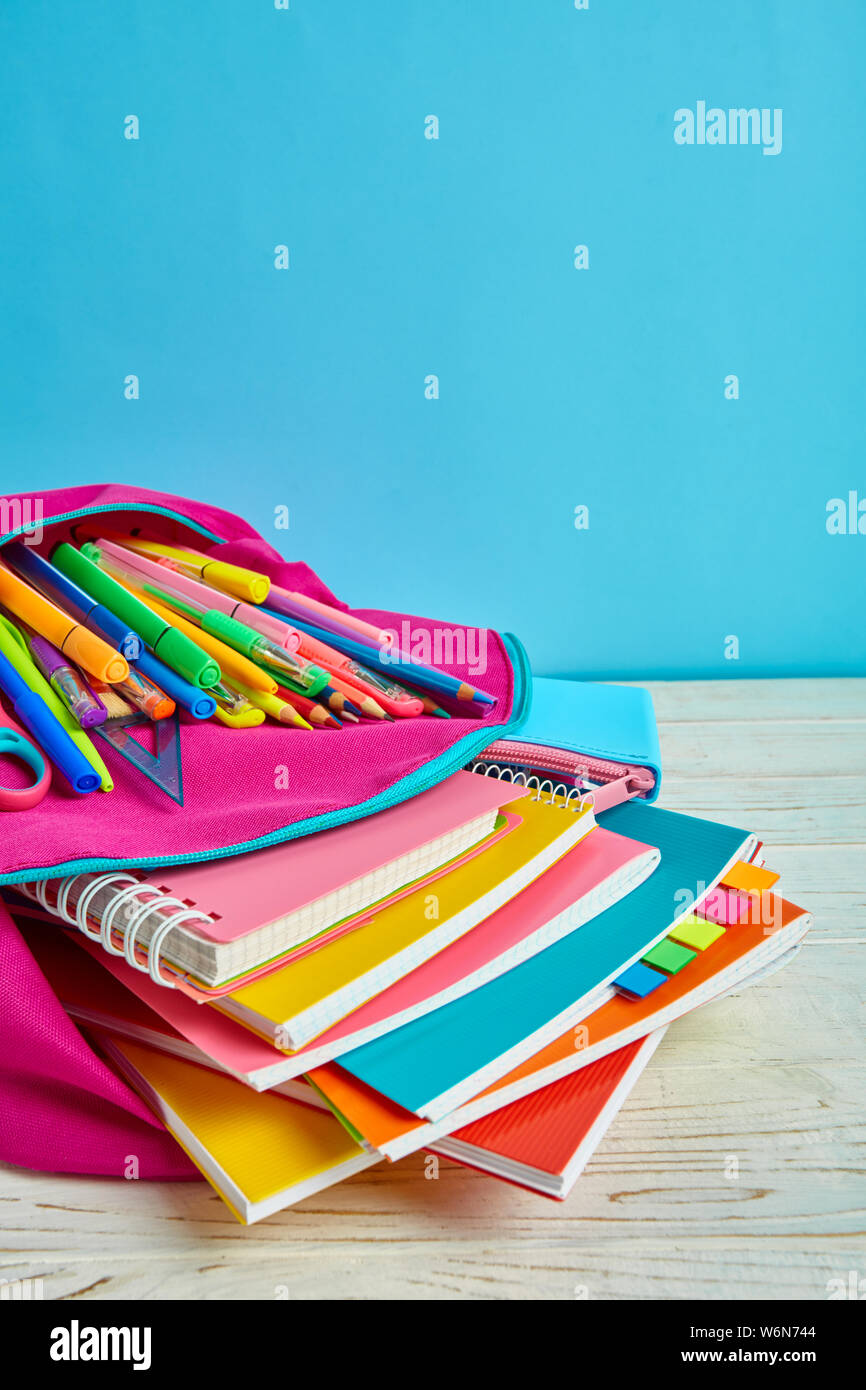 A briefcase with notebooks and handles on a white table Stock Photo - Alamy