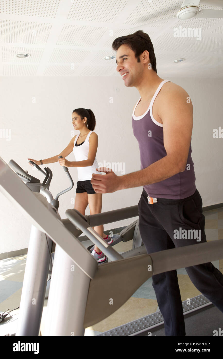 People exercising in a gym Stock Photo - Alamy