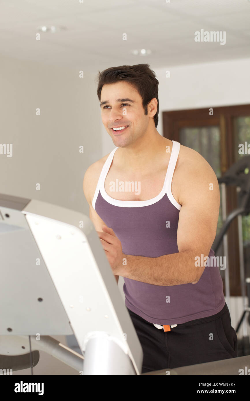 Man exercising in a gym hi-res stock photography and images - Alamy