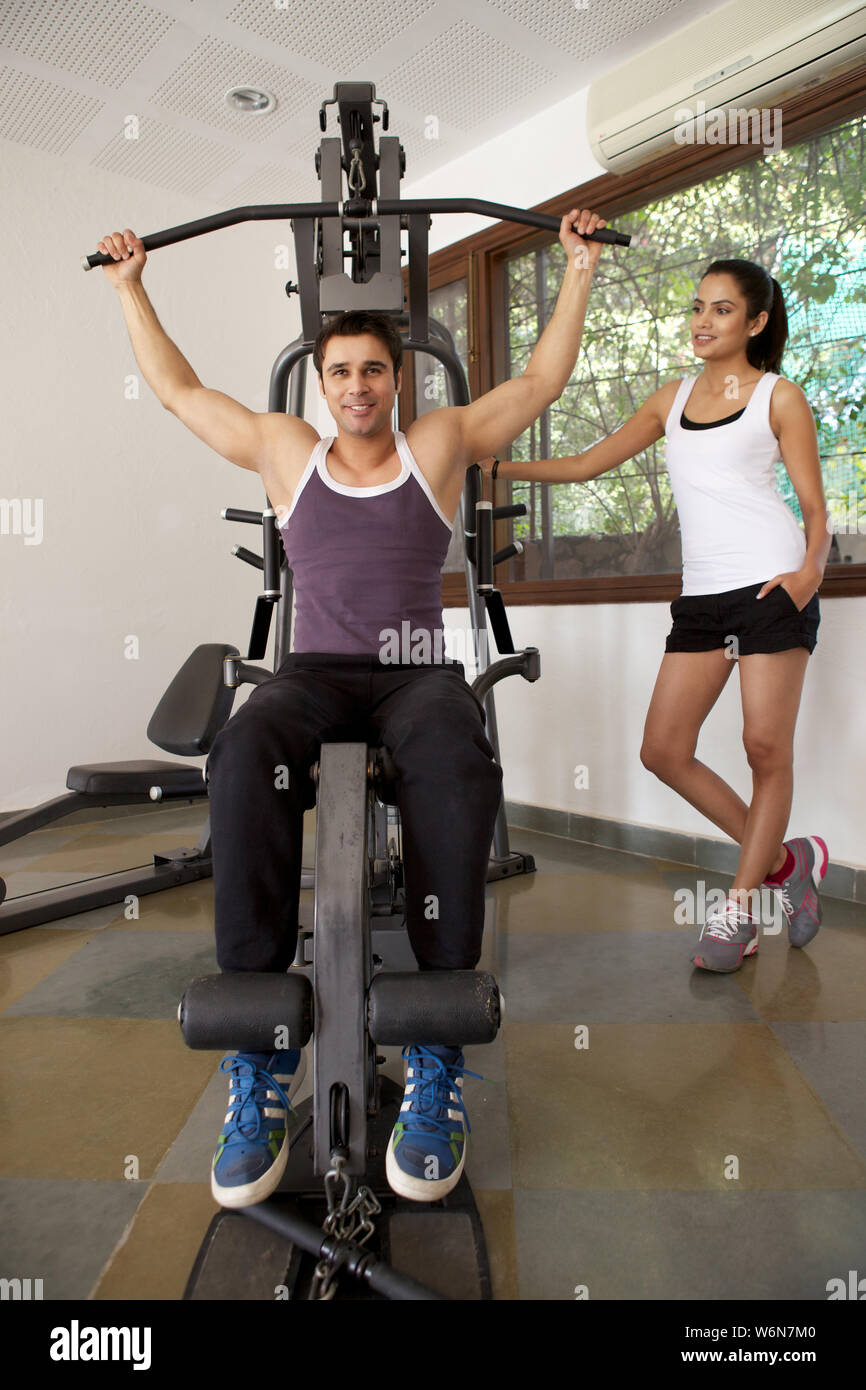 People exercising in a gym Stock Photo - Alamy