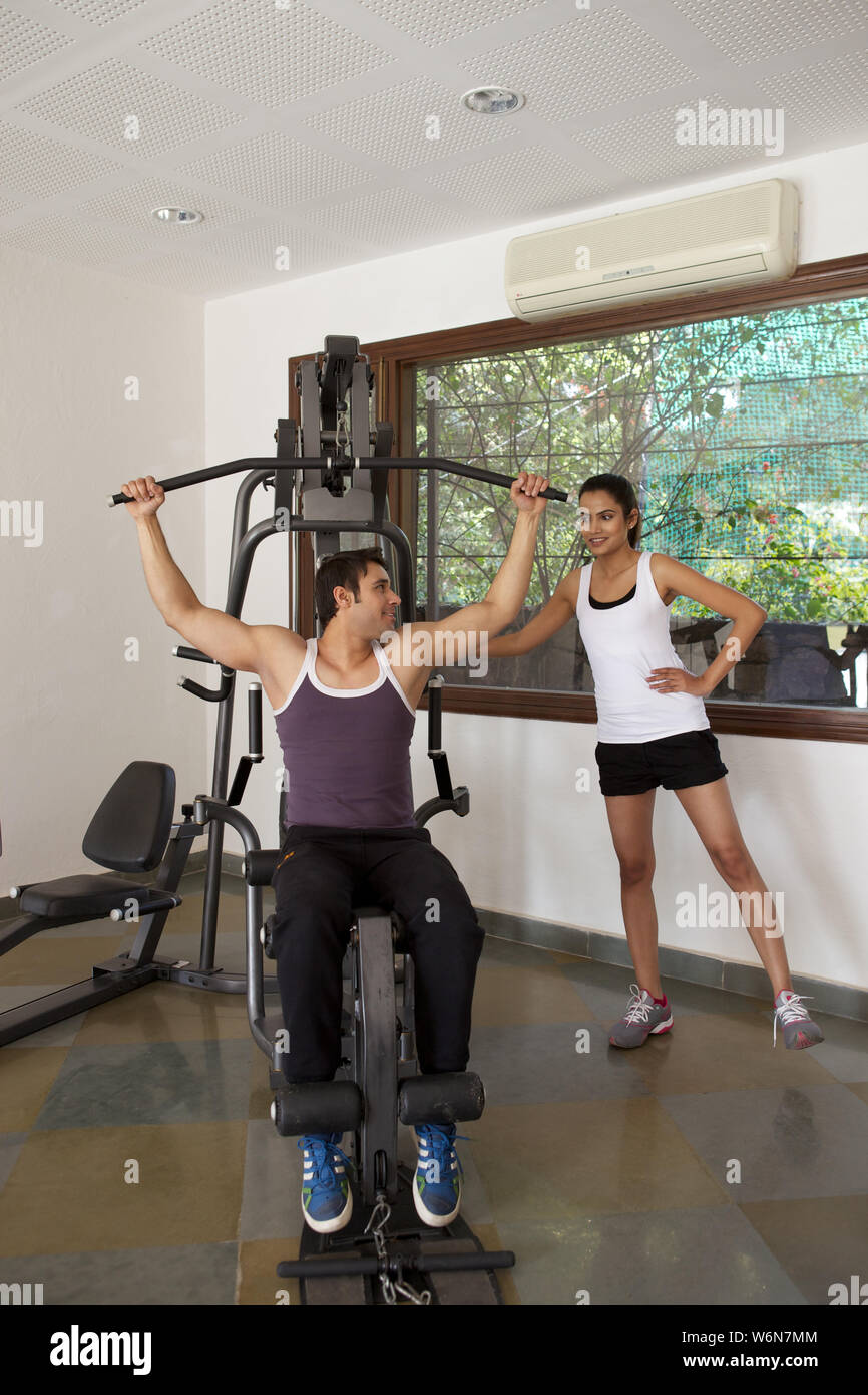People exercising in a gym Stock Photo - Alamy