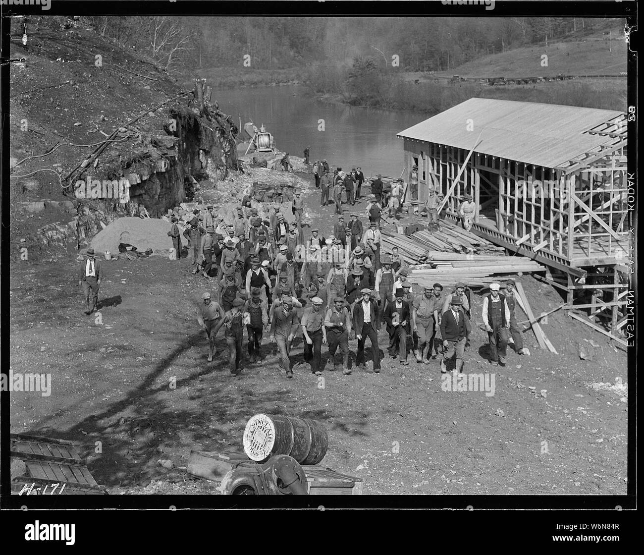 Workers returning from construction on the new bridge at Norris Dam ...