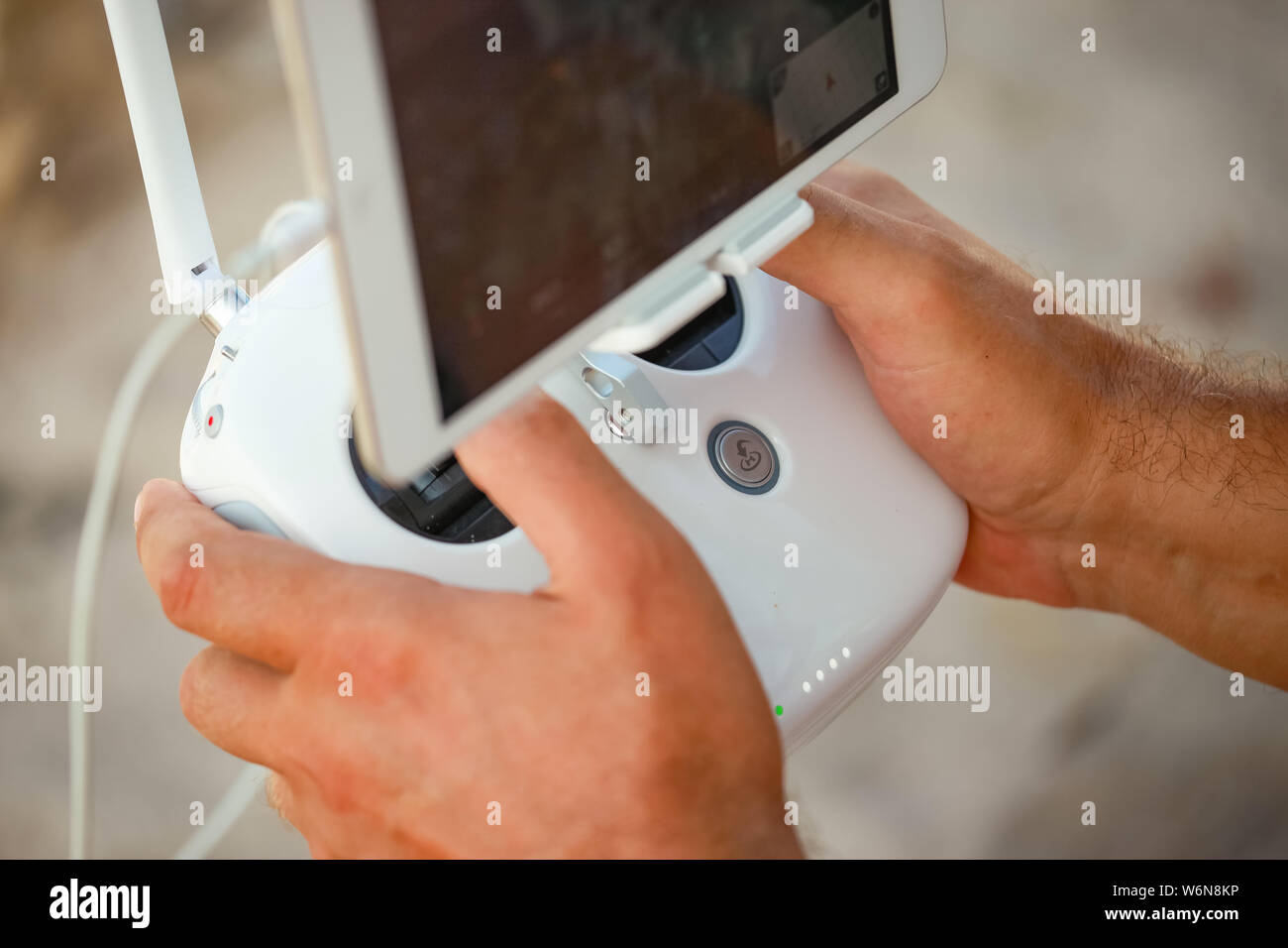 Remote control drone male hands Stock Photo - Alamy