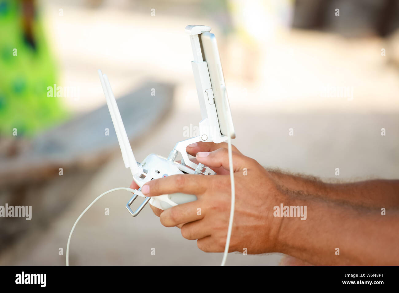 Remote control drone male hands Stock Photo - Alamy