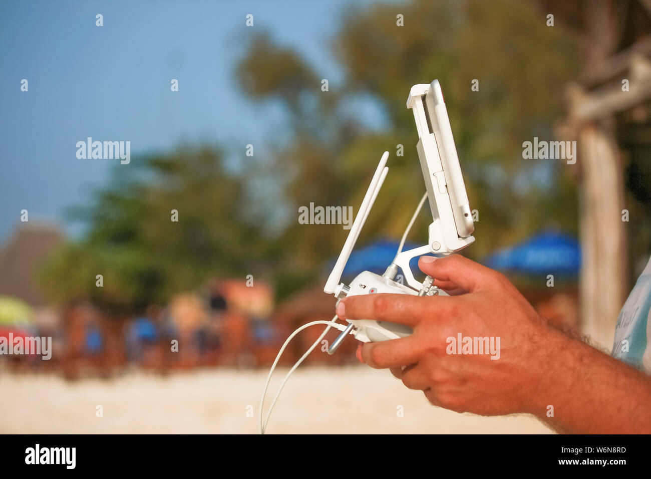 Remote control drone male hands Stock Photo - Alamy