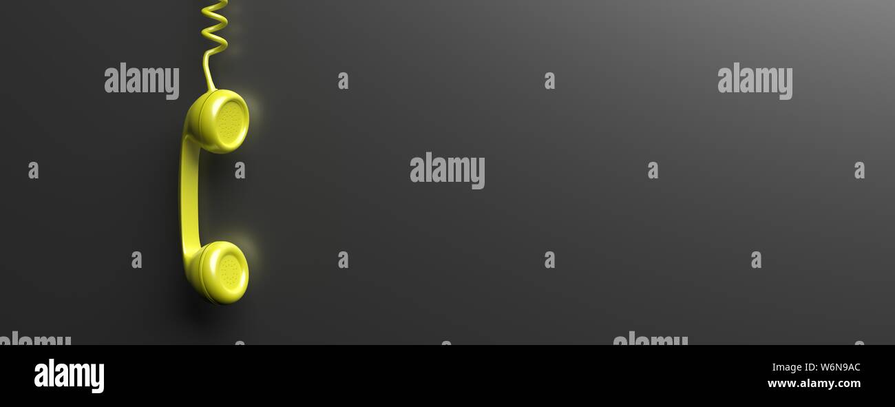 Phone yellow color. Phone receiver classic, old against black ...