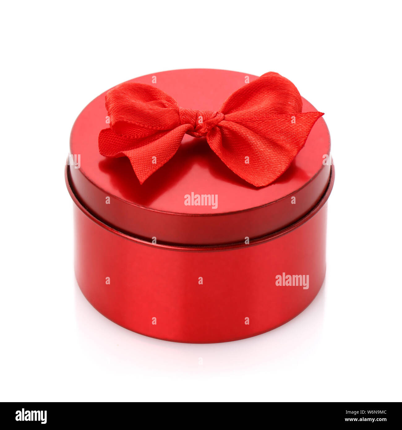 Single red gift box with red ribbon Stock Photo - Alamy