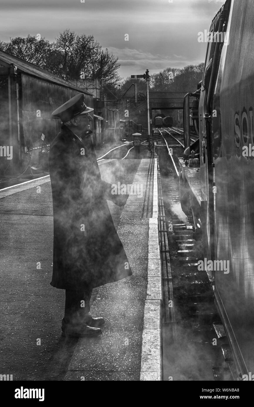The Station Master in Steam Stock Photo - Alamy