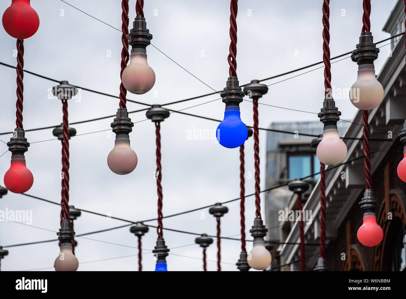 London, UK, July 28, 2019. A decorative display of large light bulbs ...