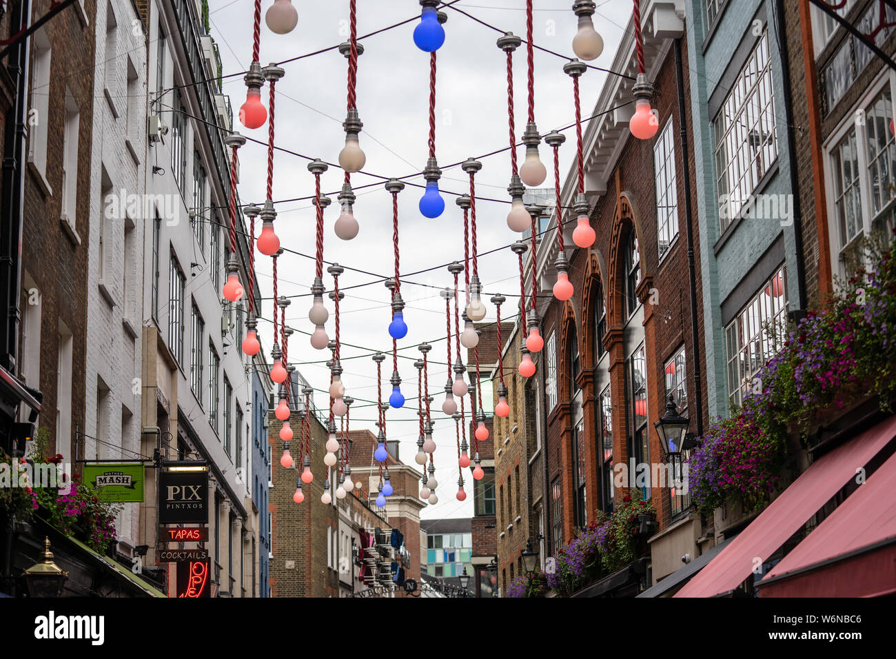 London, UK, July 28, 2019. A decorative display of large light bulbs ...