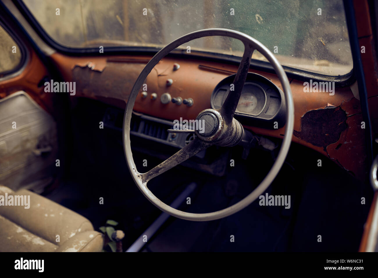 Interior of an old vintage car wreck in an old street Stock Photo - Alamy