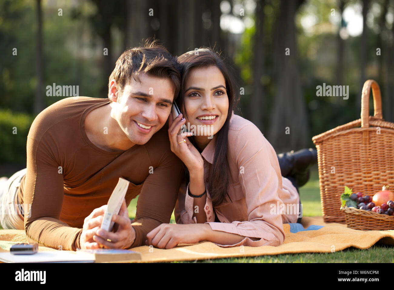 Woman talking on mobile phone with her husband Stock Photo - Alamy