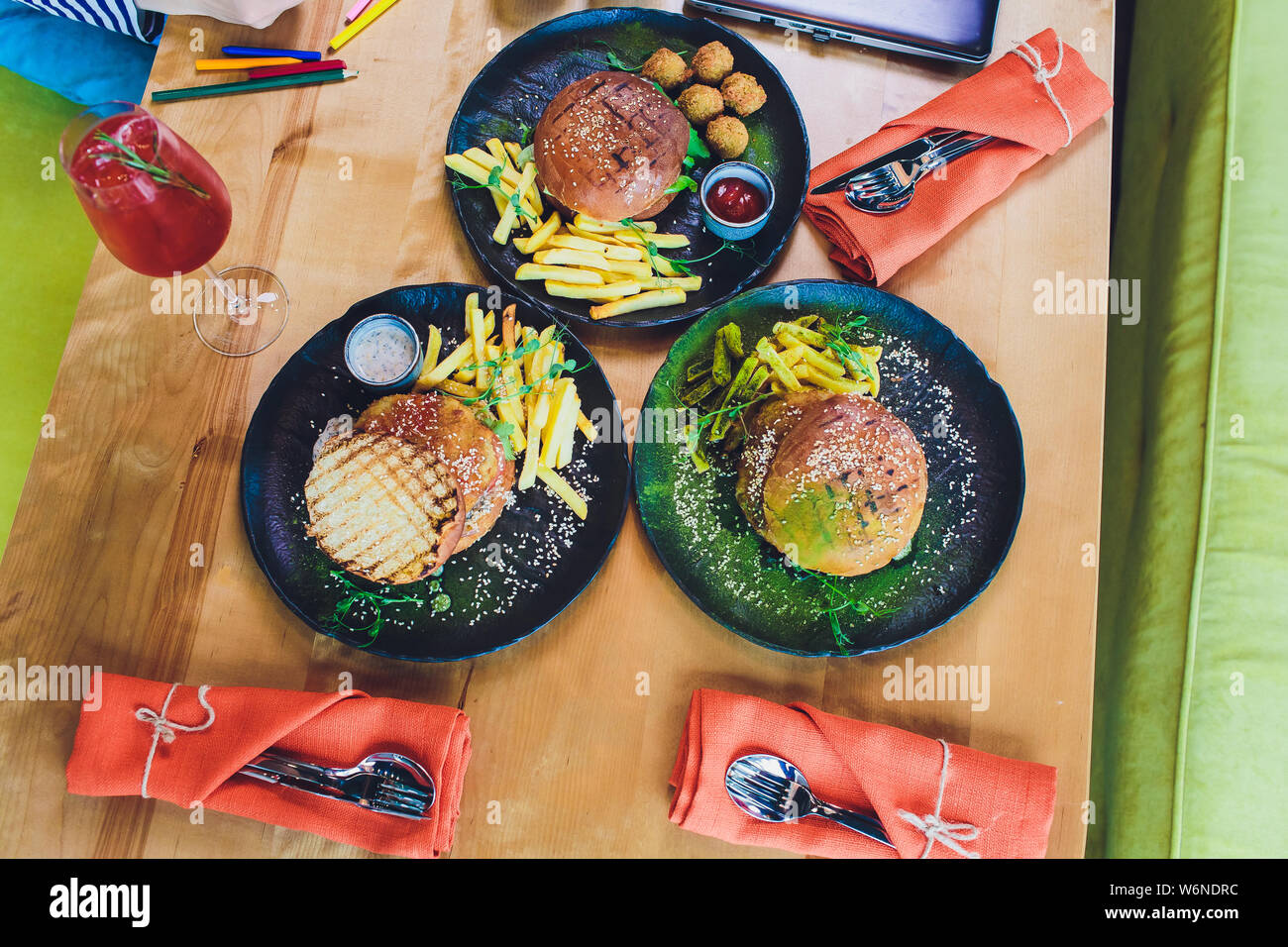 Red, green,black mini burgers with quinoa and vegetables Stock Photo ...