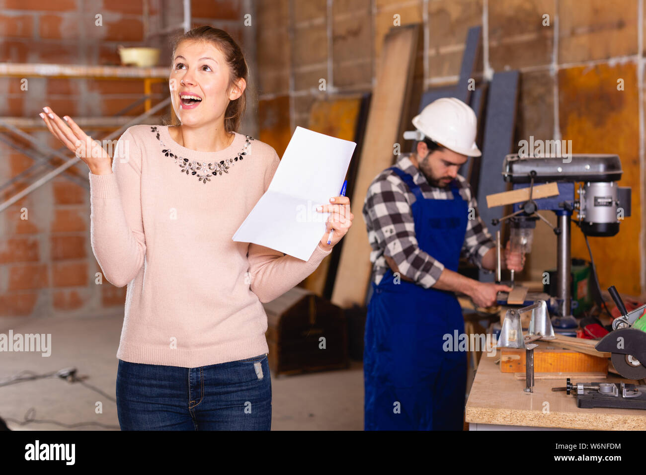 Architect checks building plan hi-res stock photography and images - Alamy