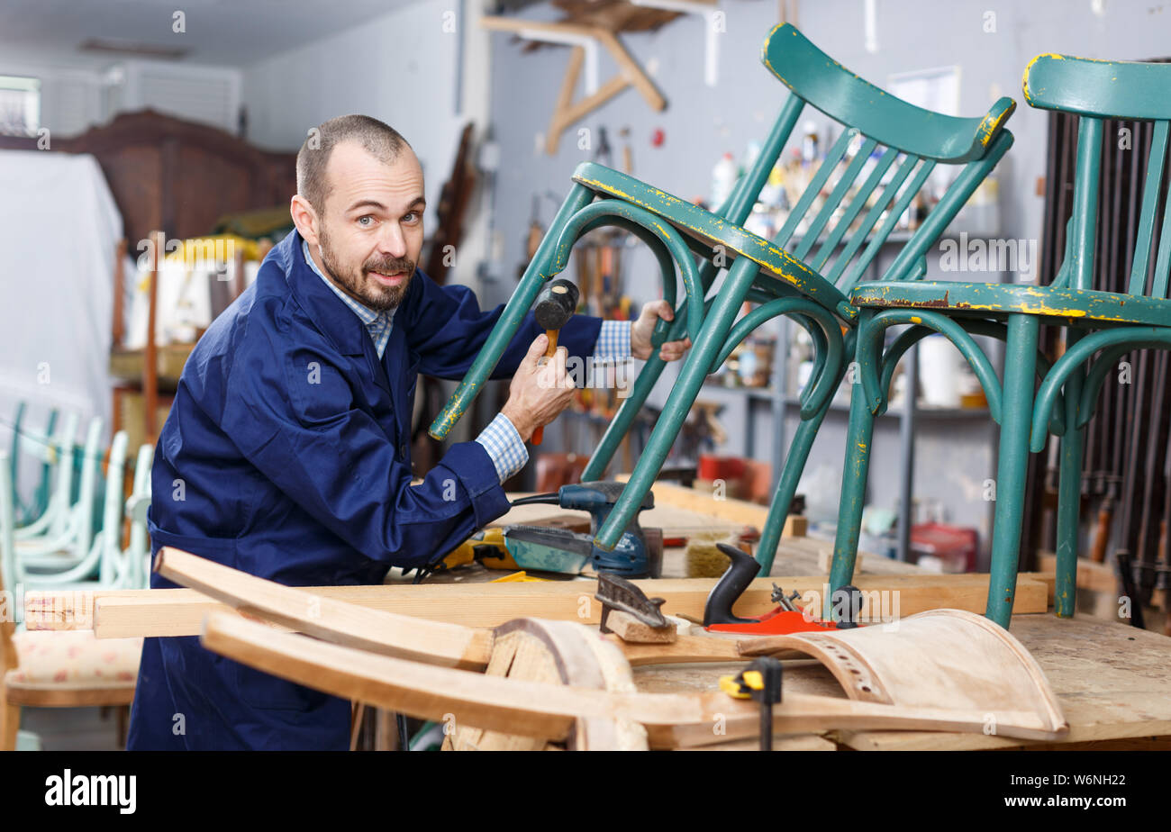 Restorer in process renovation hi-res stock photography and images - Alamy
