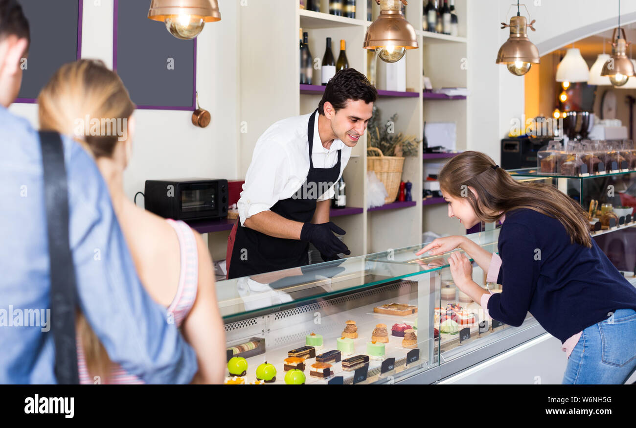 Family couple choosing cakes hi-res stock photography and images - Alamy
