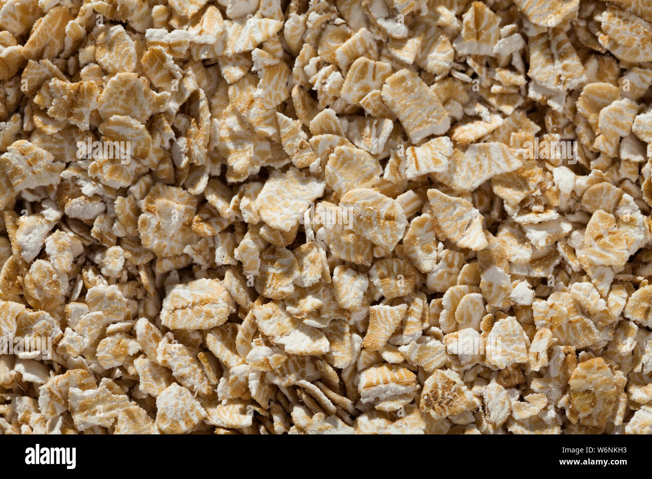 Diet food. Uncooked rolled oats as natural background Stock Photo - Alamy